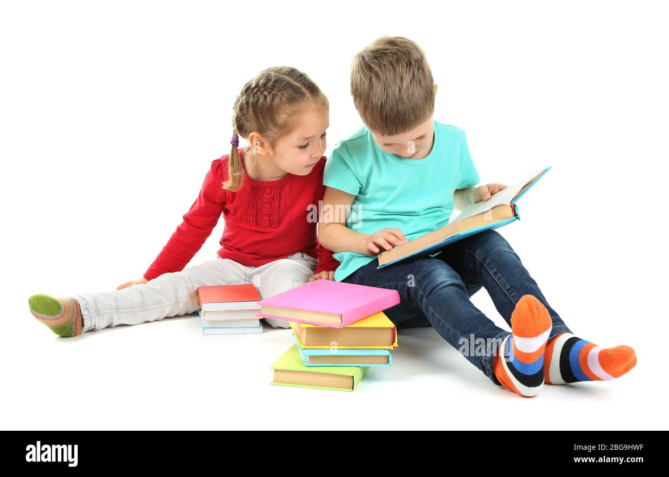 Little children with books isolated on white Stock Photo - Alamy