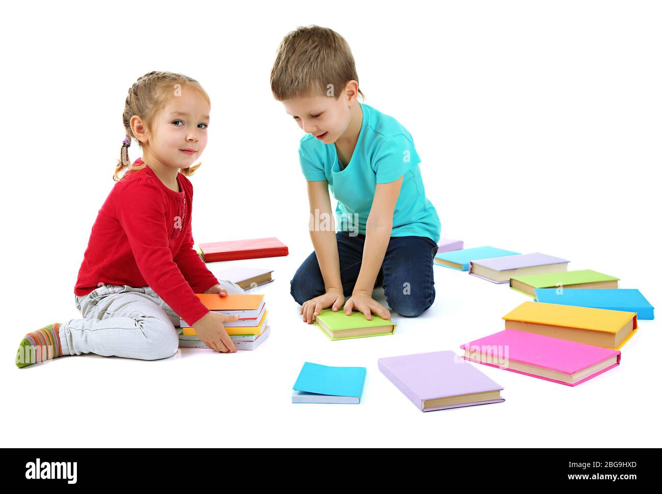 Little children with books isolated on white Stock Photo - Alamy