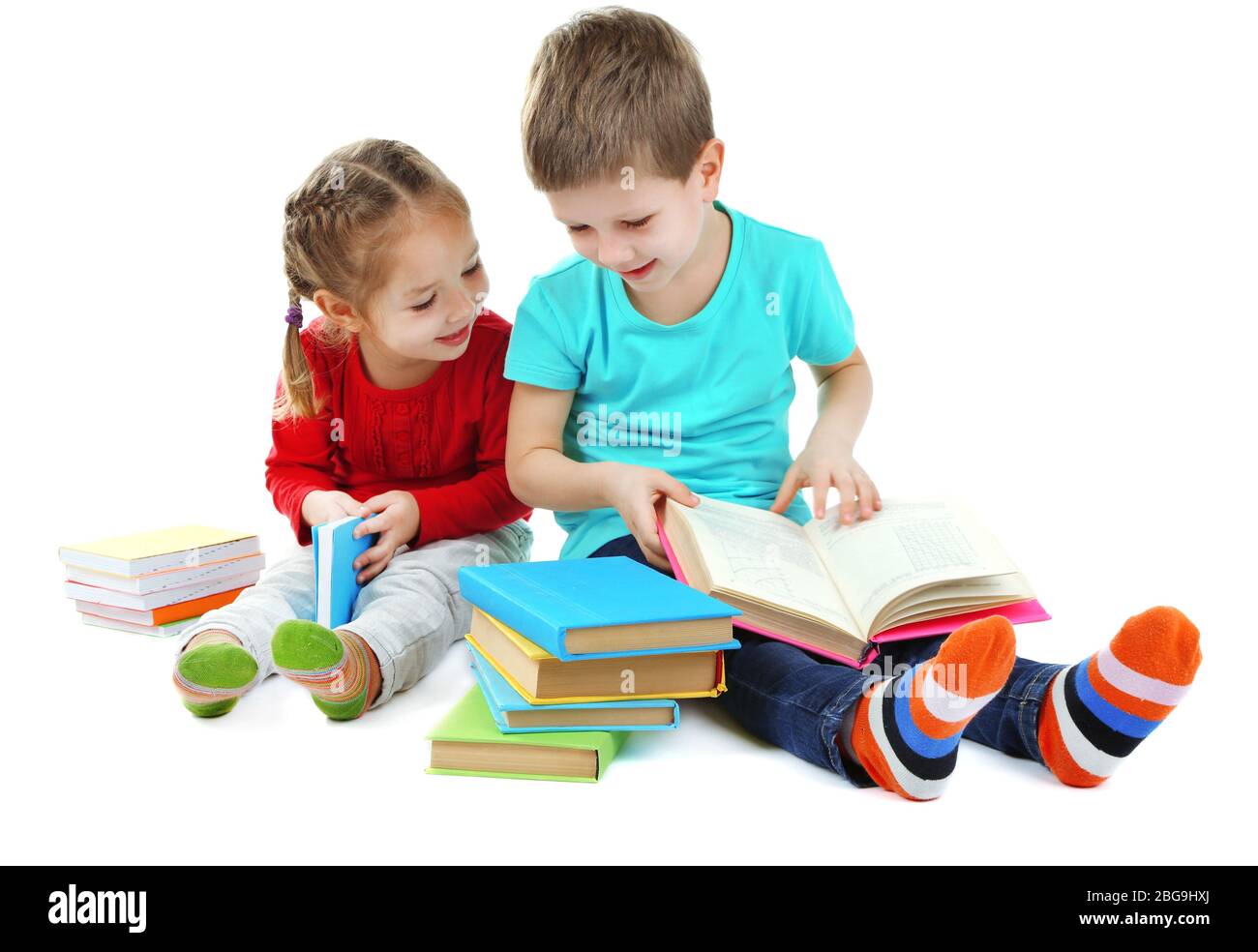 Little children with books isolated on white Stock Photo - Alamy