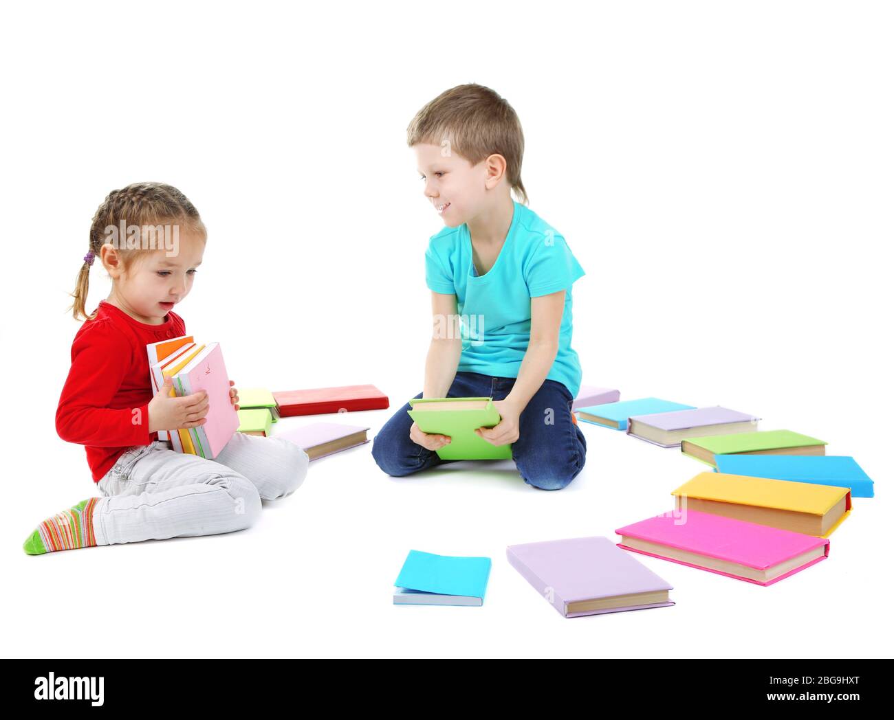 Little children with books isolated on white Stock Photo - Alamy