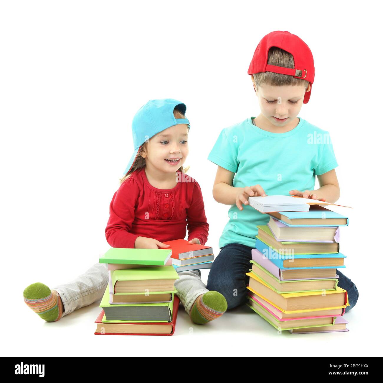 Little children with books isolated on white Stock Photo - Alamy