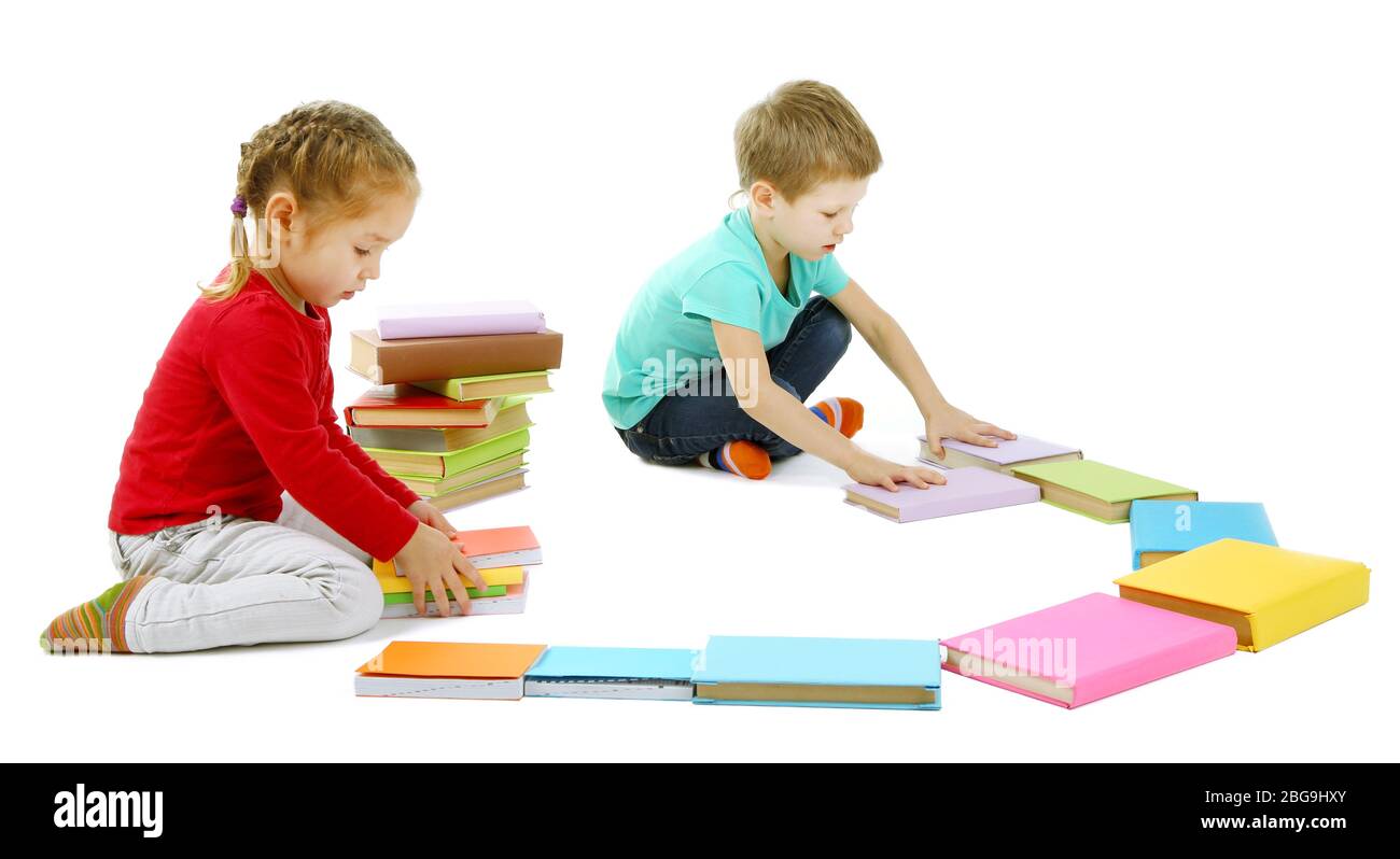Little children with books isolated on white Stock Photo - Alamy