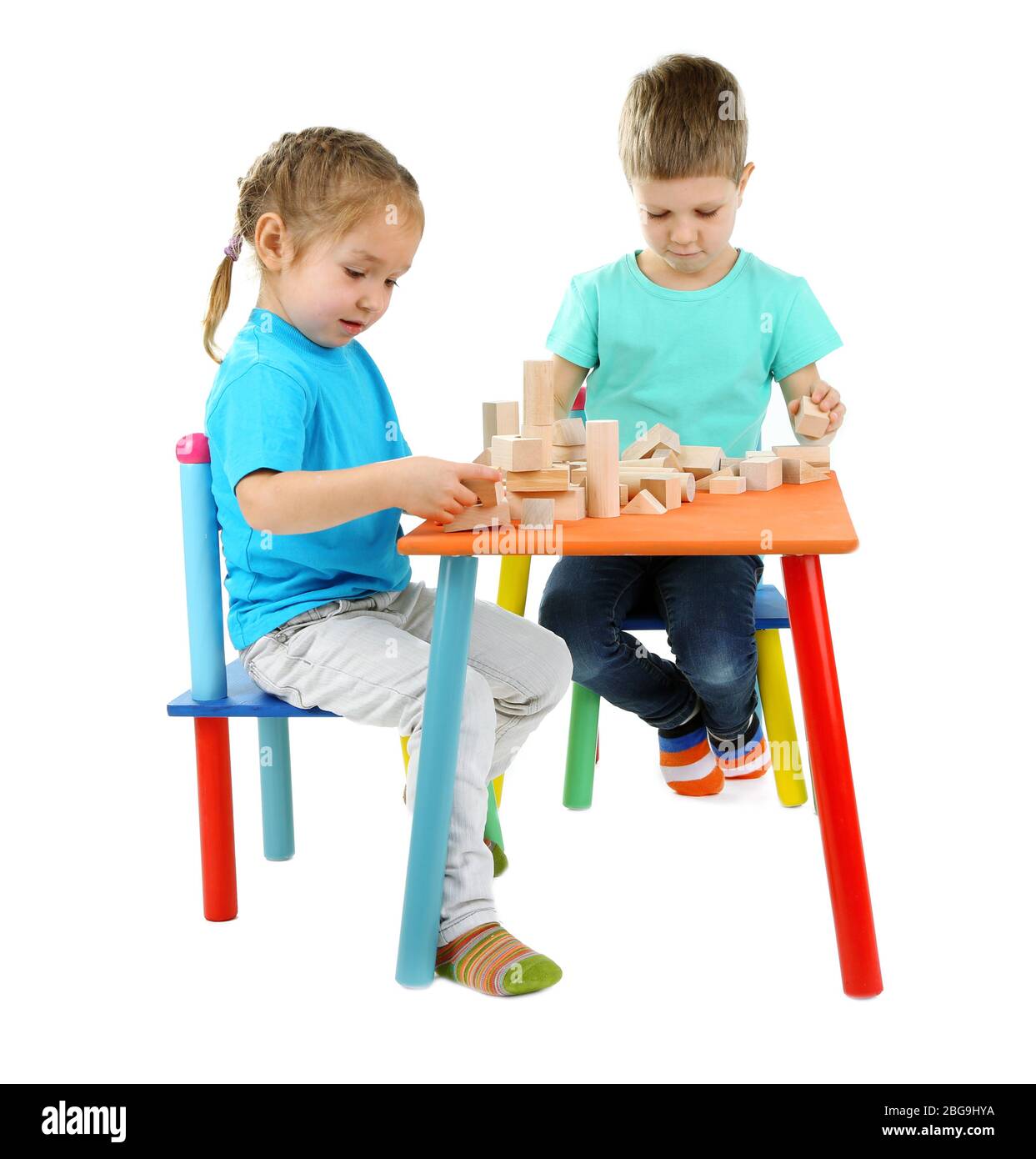 Little children playing with building blocks isolated on white Stock ...