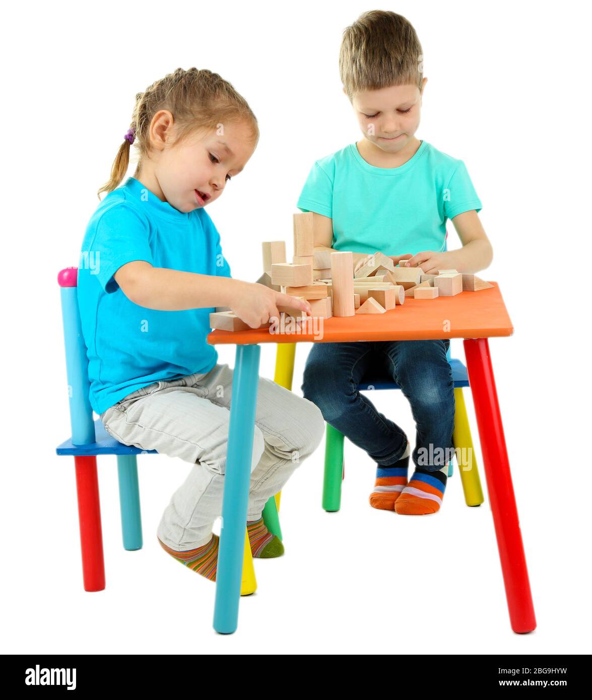Little children playing with building blocks isolated on white Stock ...