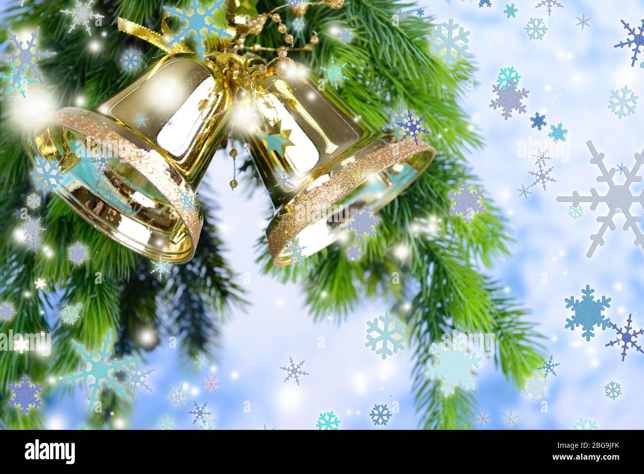 Bells with Christmas decoration on light background Stock Photo - Alamy