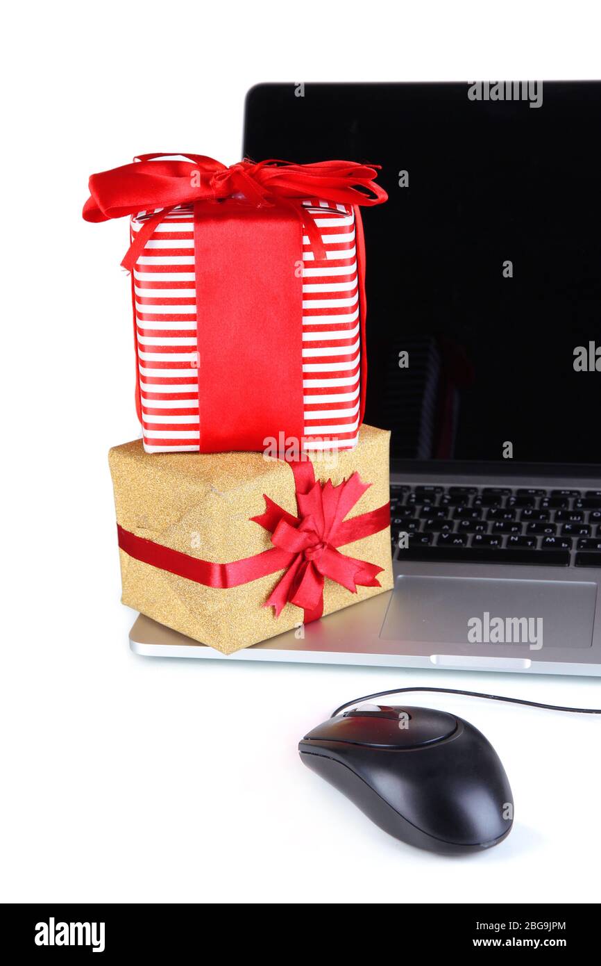 Laptop, gifts and computer mouse isolated on white Stock Photo - Alamy