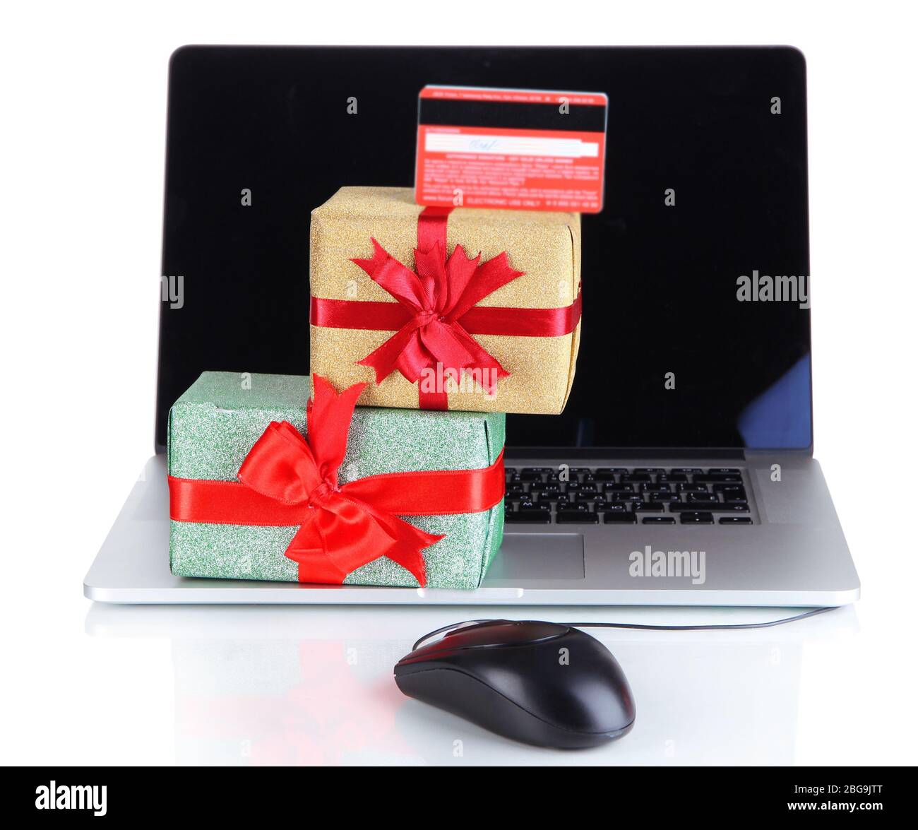 Laptop, gifts and computer mouse isolated on white Stock Photo - Alamy