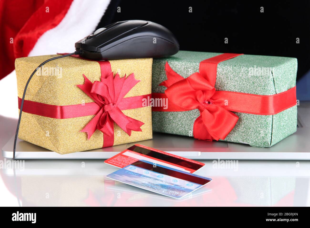 Laptop, gift and computer mouse isolated on white Stock Photo - Alamy