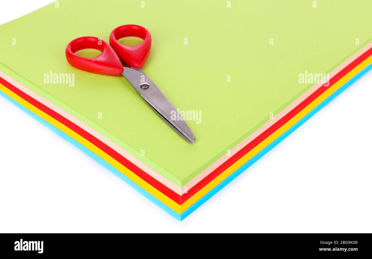 Colorful cardboard and scissors on white background Stock Photo - Alamy