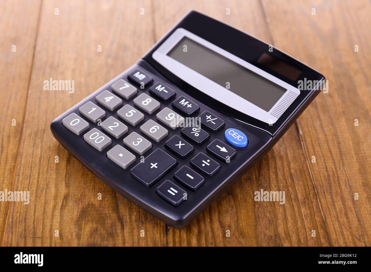 Digital calculator on table close-up Stock Photo - Alamy