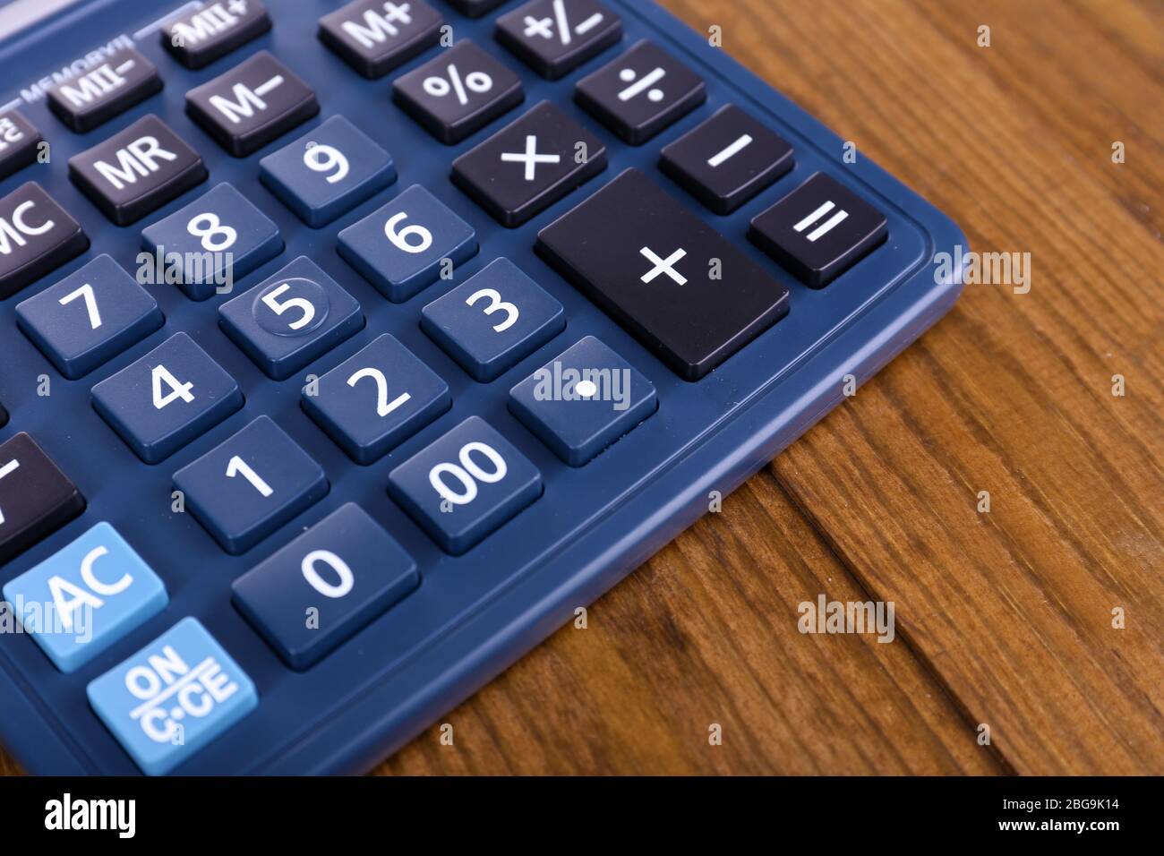 Digital calculator on table close-up Stock Photo - Alamy
