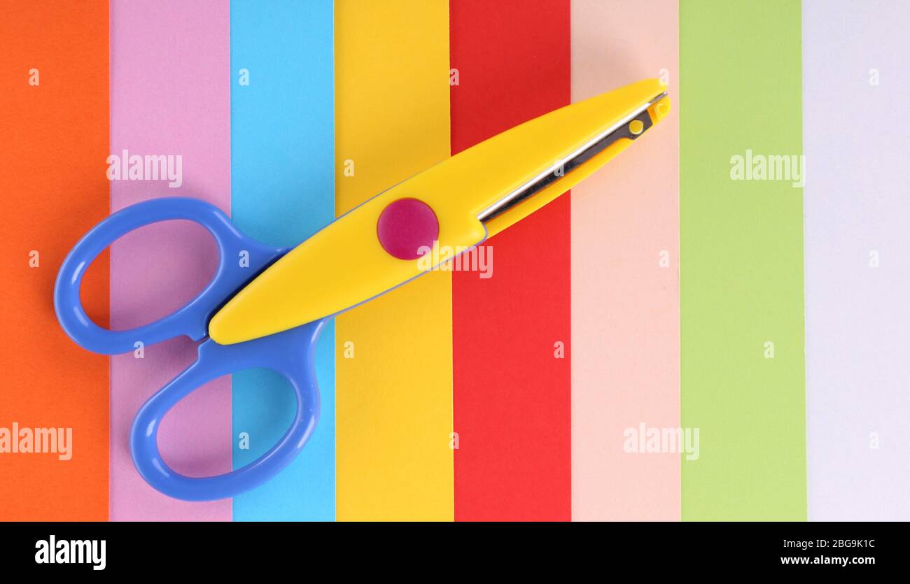 Colorful cardboard and scissors close-up Stock Photo - Alamy