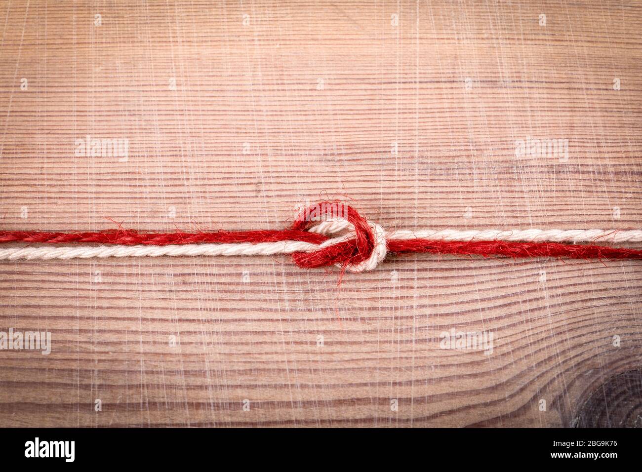 OVERHAND BOW knot. Example of training and information. Red and white ...