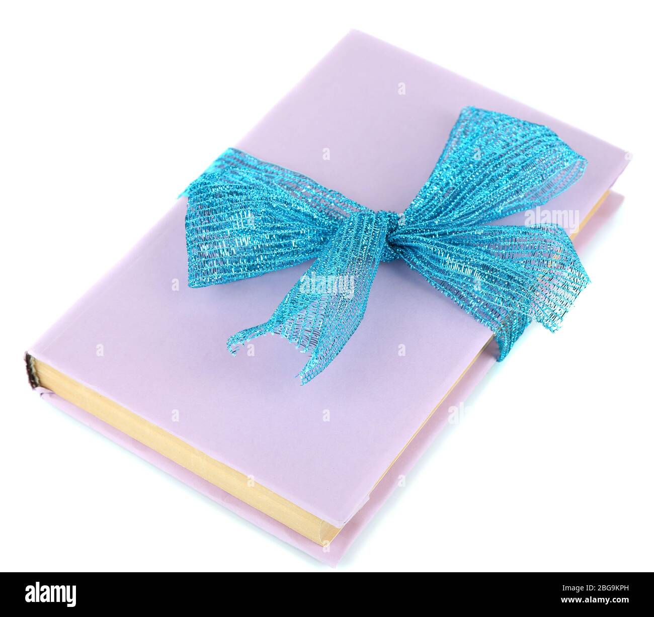 Book wrapped with color ribbon, isolated on white Stock Photo - Alamy