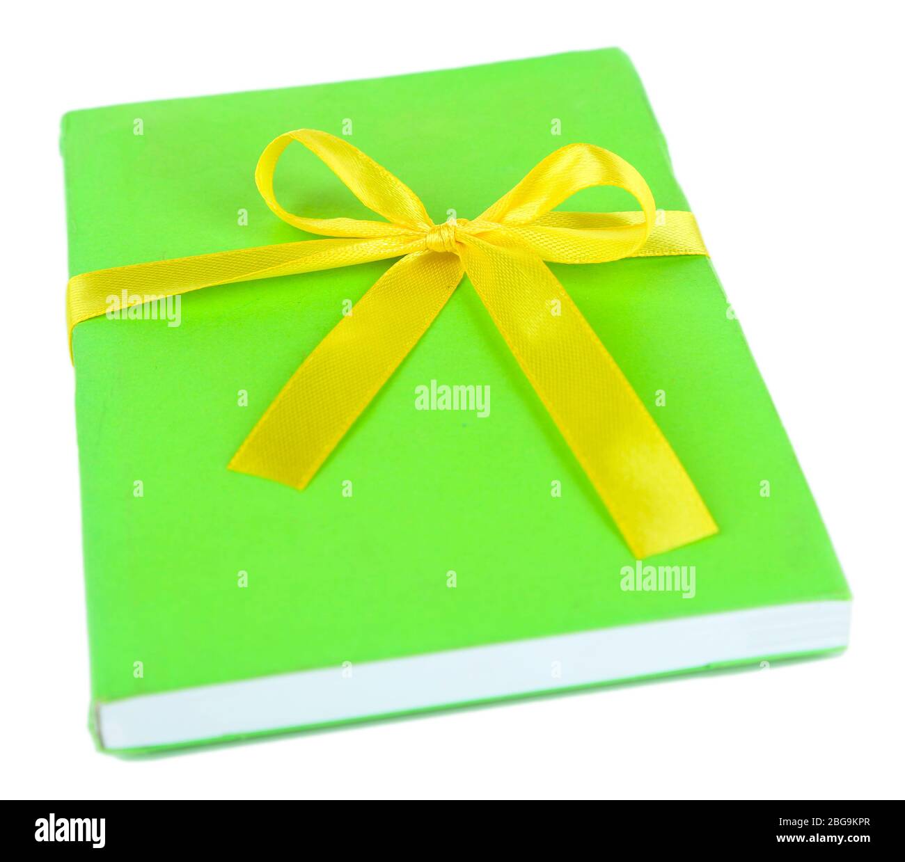 Book wrapped with color ribbon, isolated on white Stock Photo - Alamy