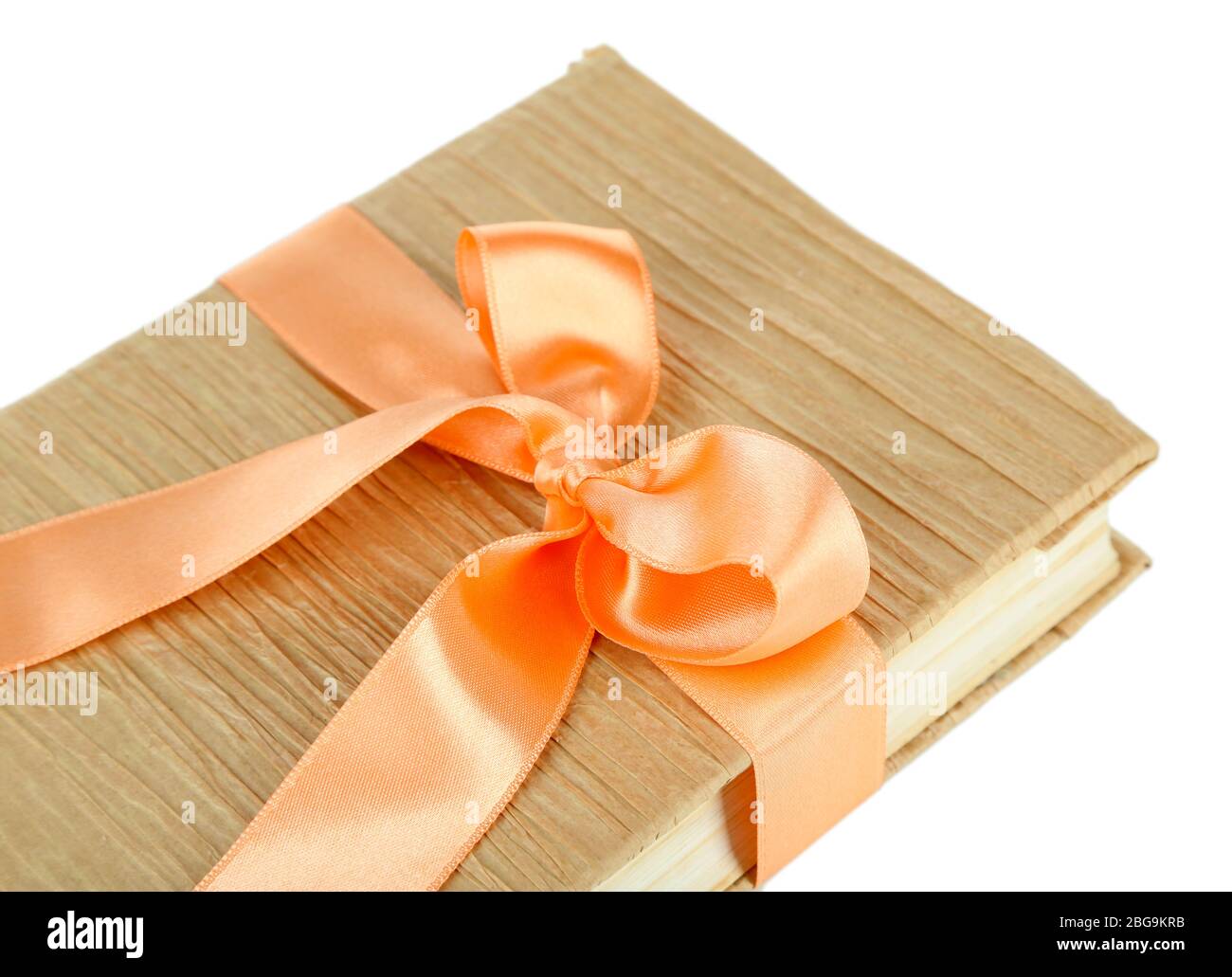 Book wrapped with color ribbon, isolated on white Stock Photo - Alamy