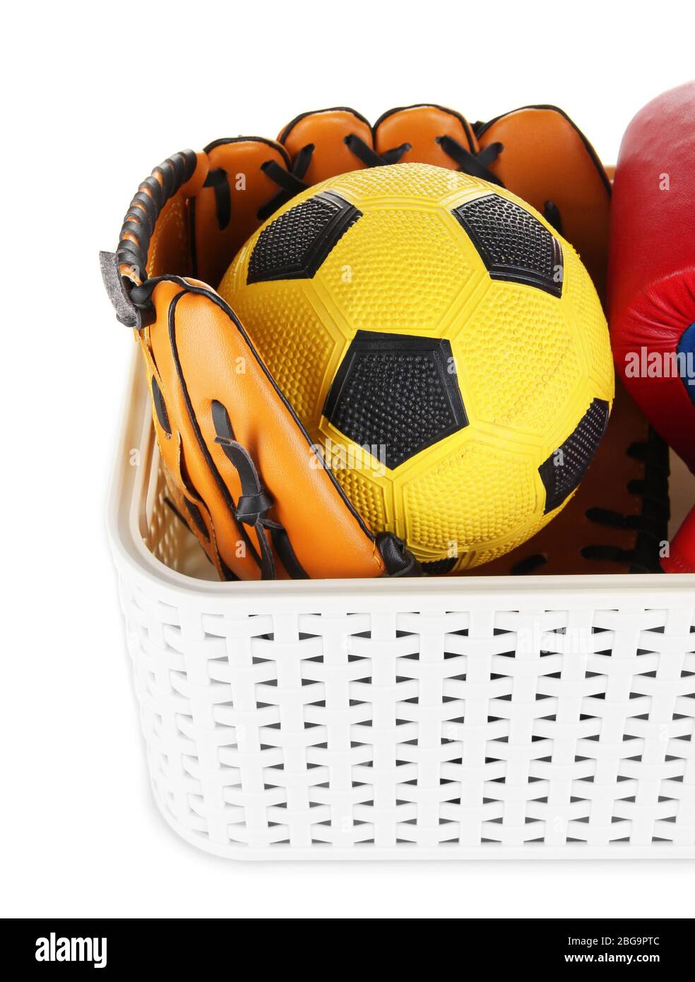 Plastic basket with sports equipment isolated on white Stock Photo - Alamy