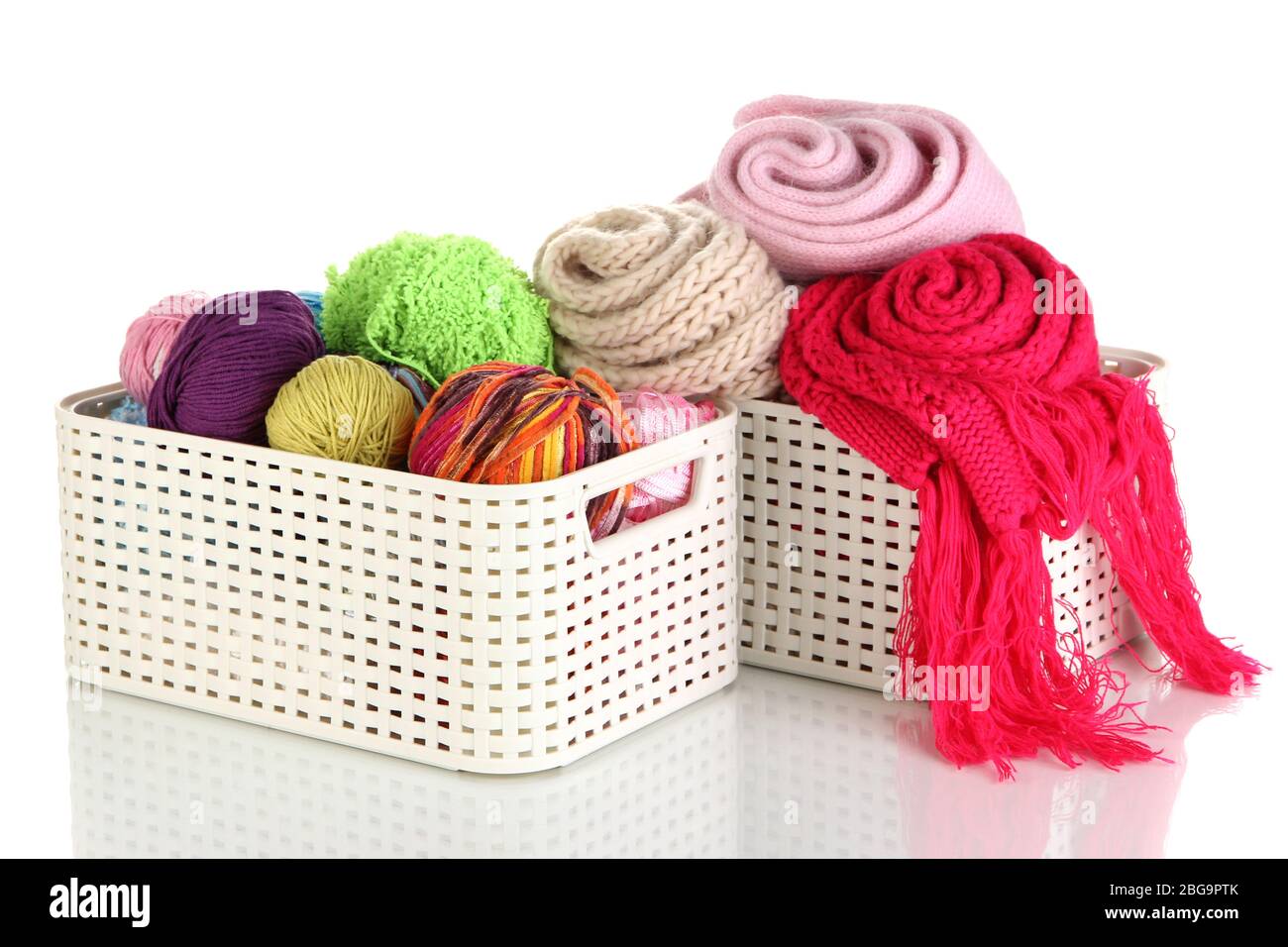 Plastic baskets with things isolated on white Stock Photo - Alamy