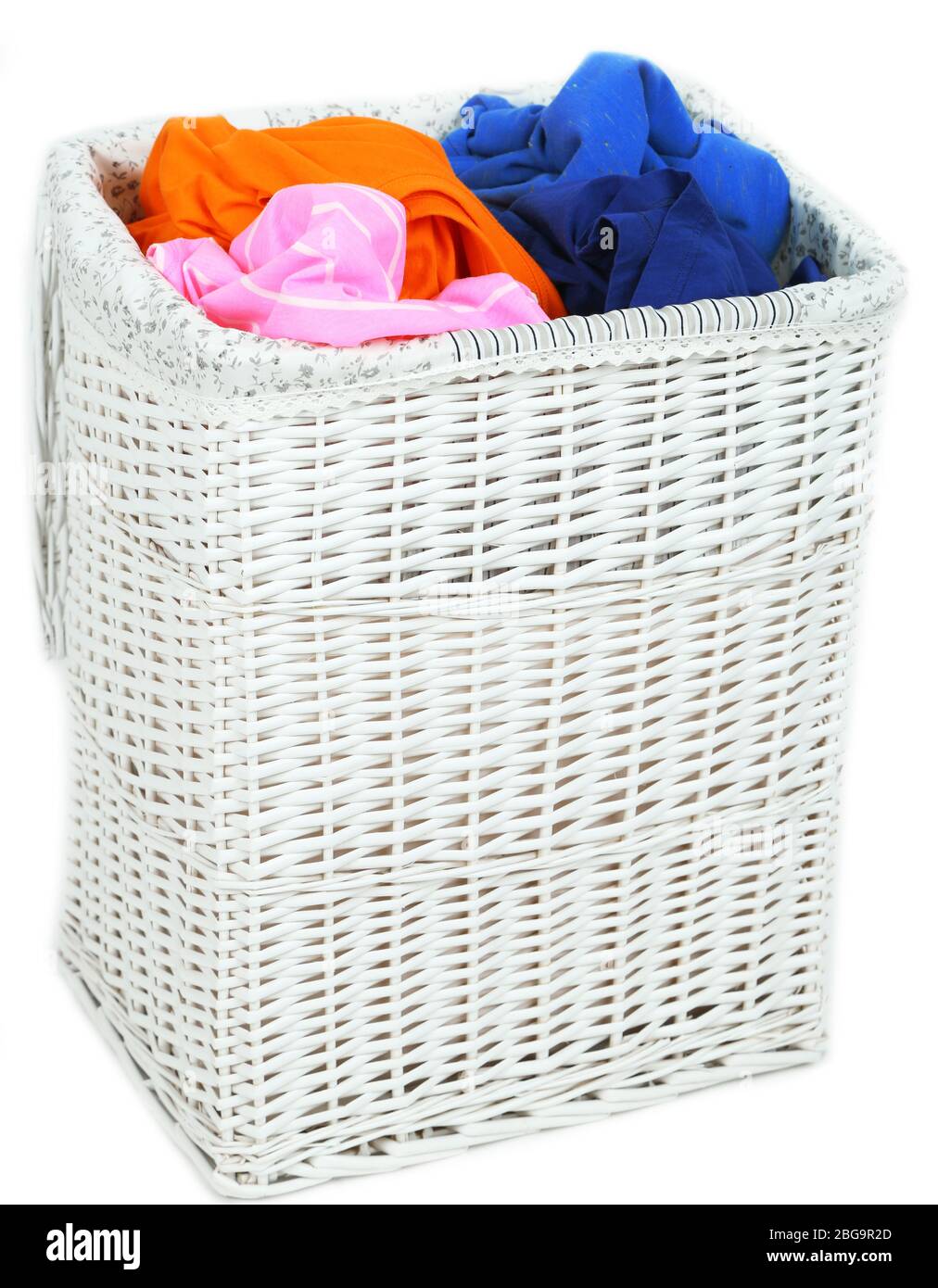 Full laundry basket isolated on white Stock Photo - Alamy