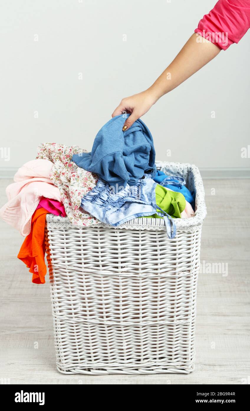Woman collect clothes floor hi-res stock photography and images - Alamy