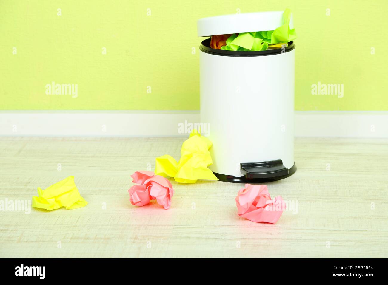 Garbage bin, on green background Stock Photo - Alamy