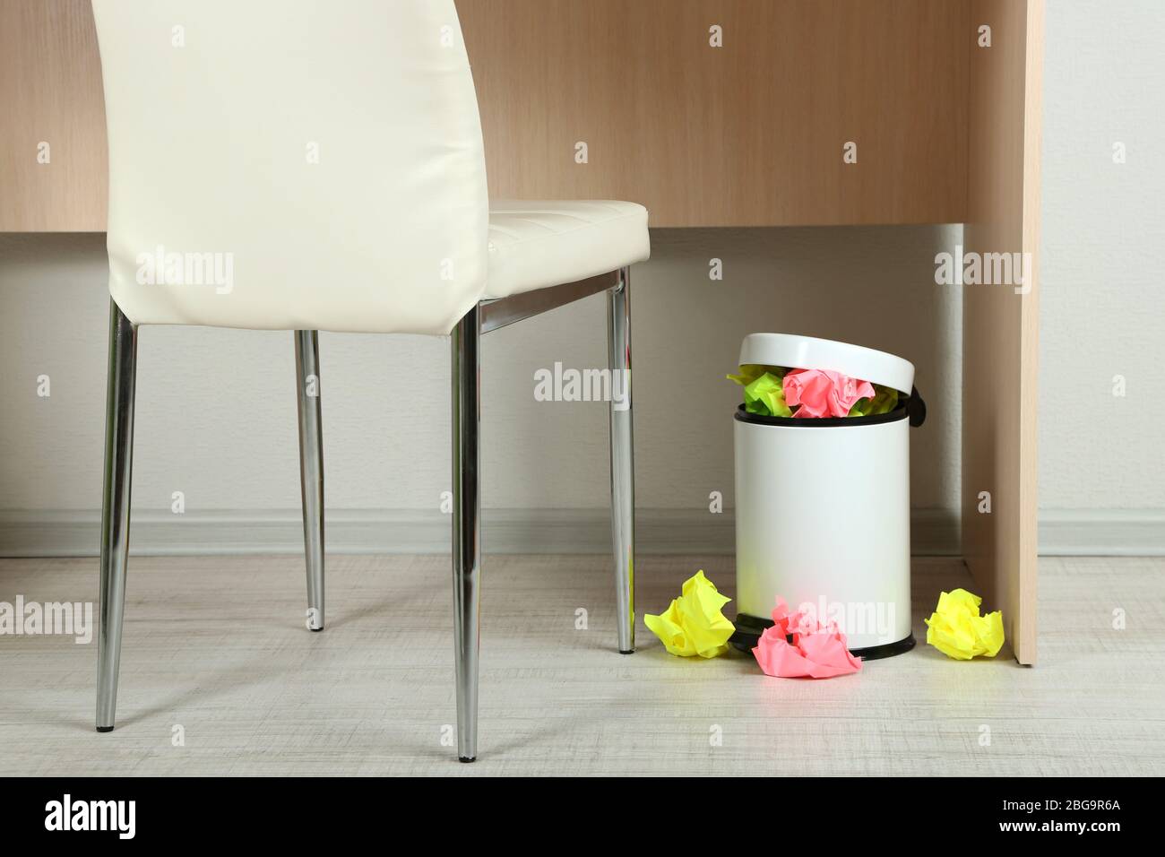 Garbage bin, on office background Stock Photo - Alamy