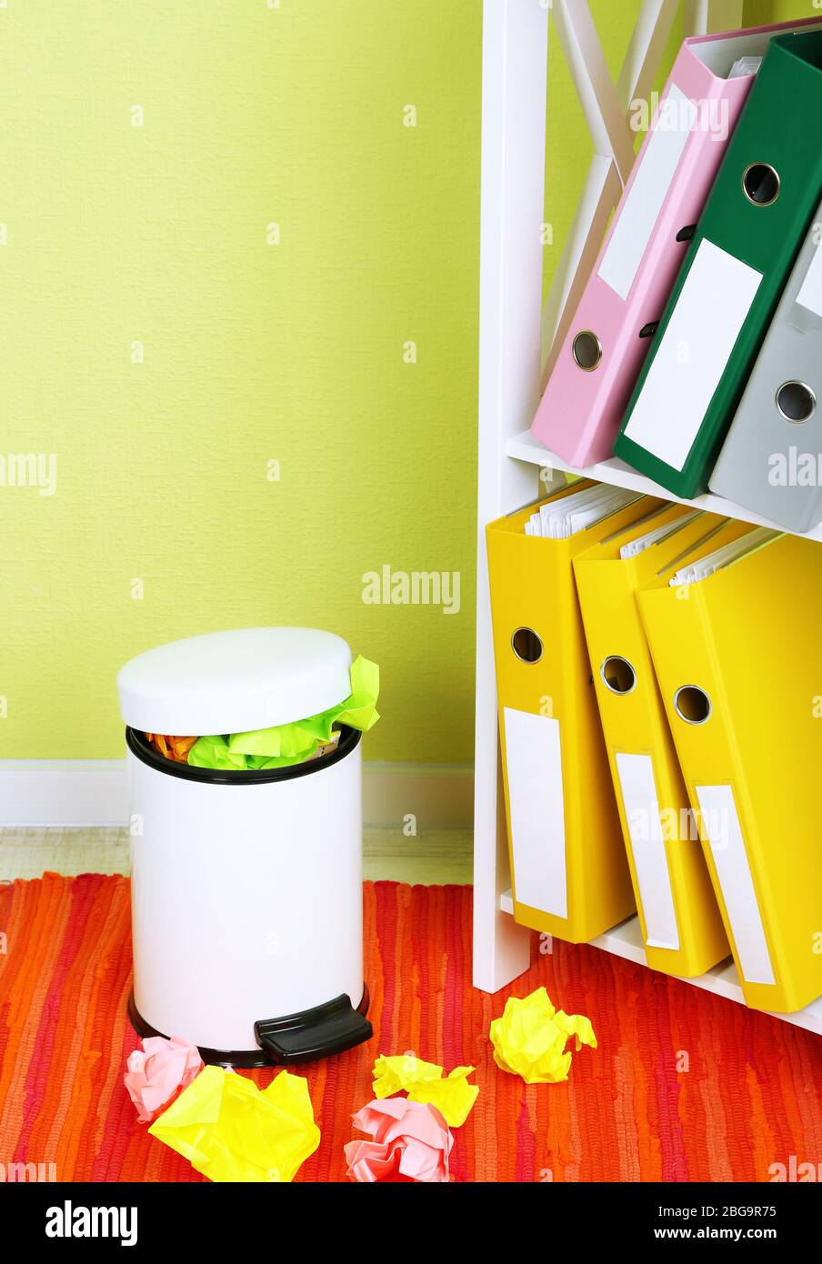 Garbage bin, on office background Stock Photo - Alamy