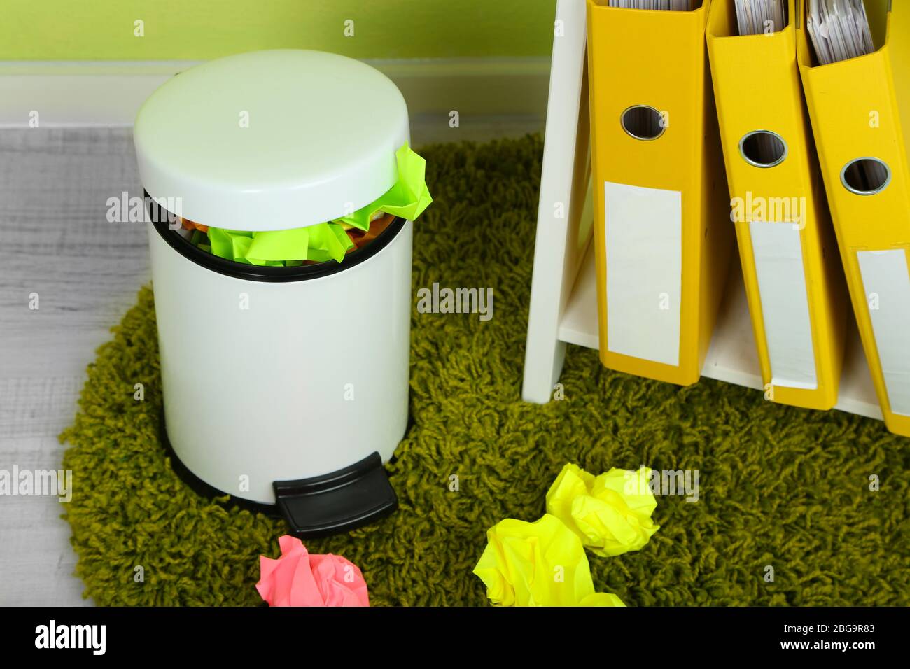 Garbage bin, on office background Stock Photo - Alamy