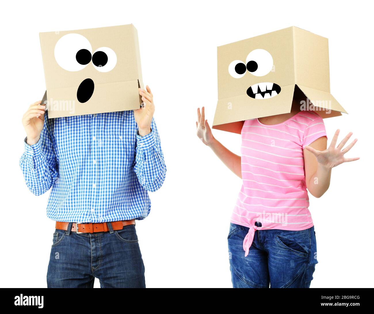 Couple with cardboard boxes on their heads isolated on white Stock ...