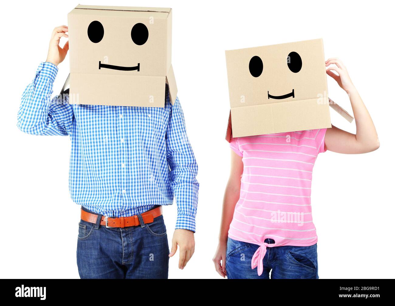 Couple with cardboard boxes on their heads isolated on white Stock ...