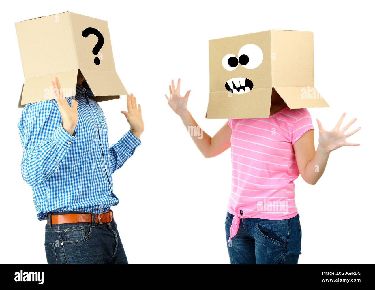 Couple with cardboard boxes on their heads isolated on white Stock ...