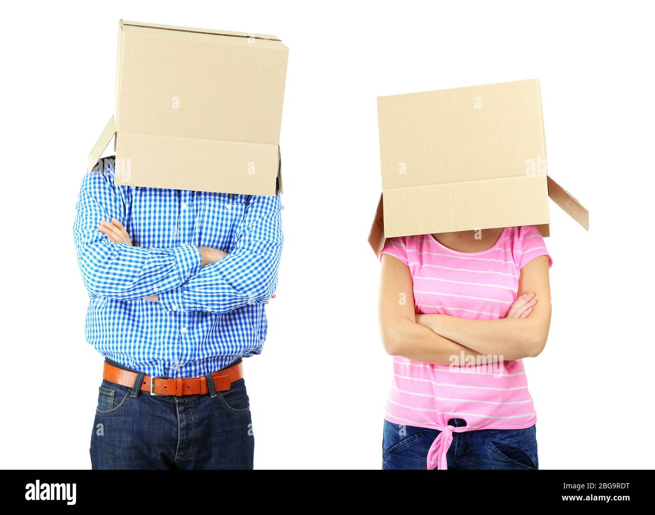 Couple with cardboard boxes on their heads isolated on white Stock ...