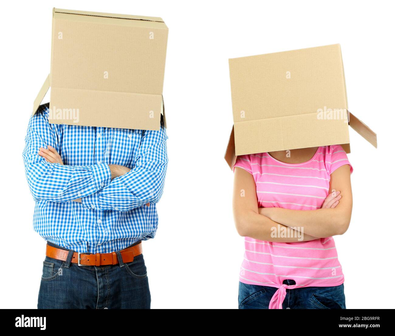 Couple with cardboard boxes on their heads isolated on white Stock ...