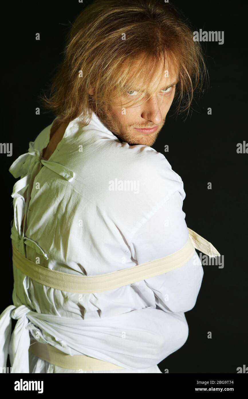 Madman in jacket hi-res stock photography and images - Alamy