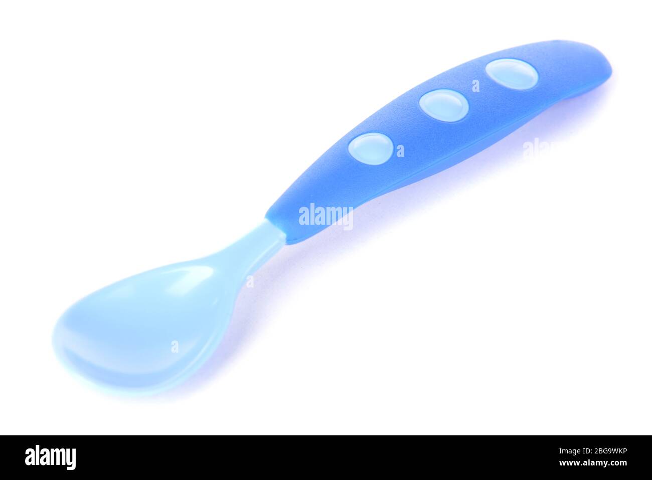 Baby spoon isolated on white Stock Photo - Alamy