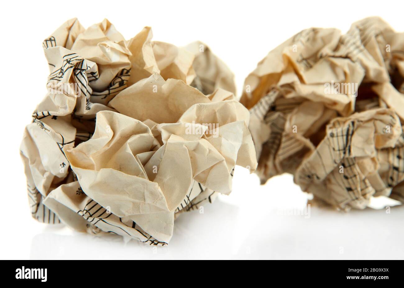 Crumpled paper balls isolated on white Stock Photo - Alamy