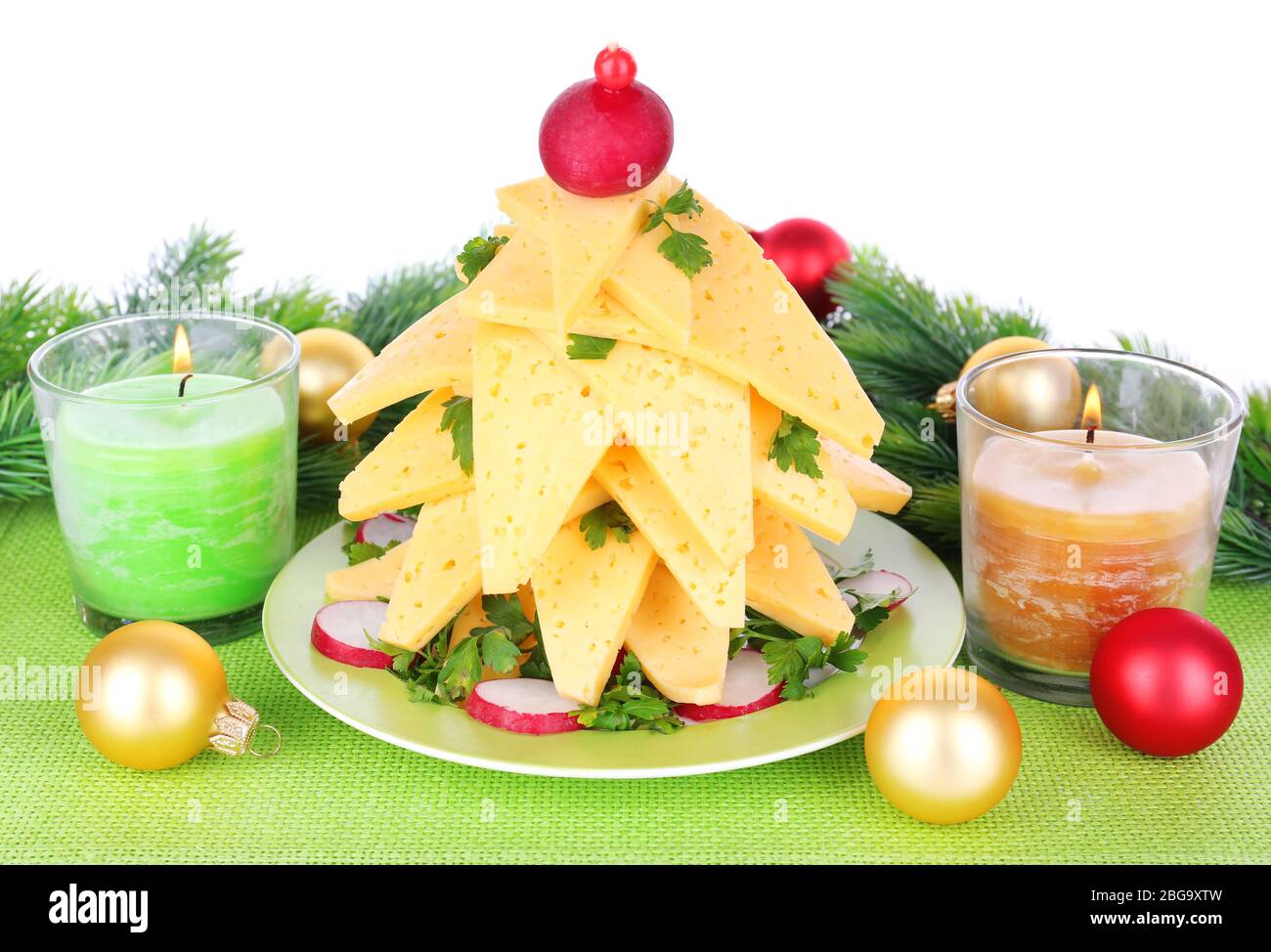 Christmas tree from cheese on table on white background Stock Photo - Alamy