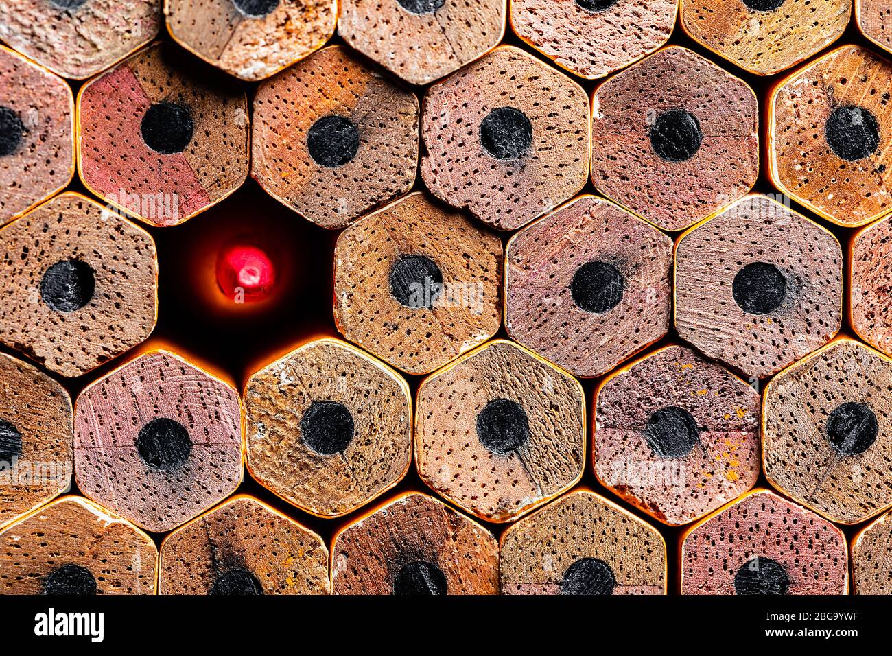 A macro OCD of a very orderly stack of new #2 unsharpened pencil ends with a triggering Red ...
