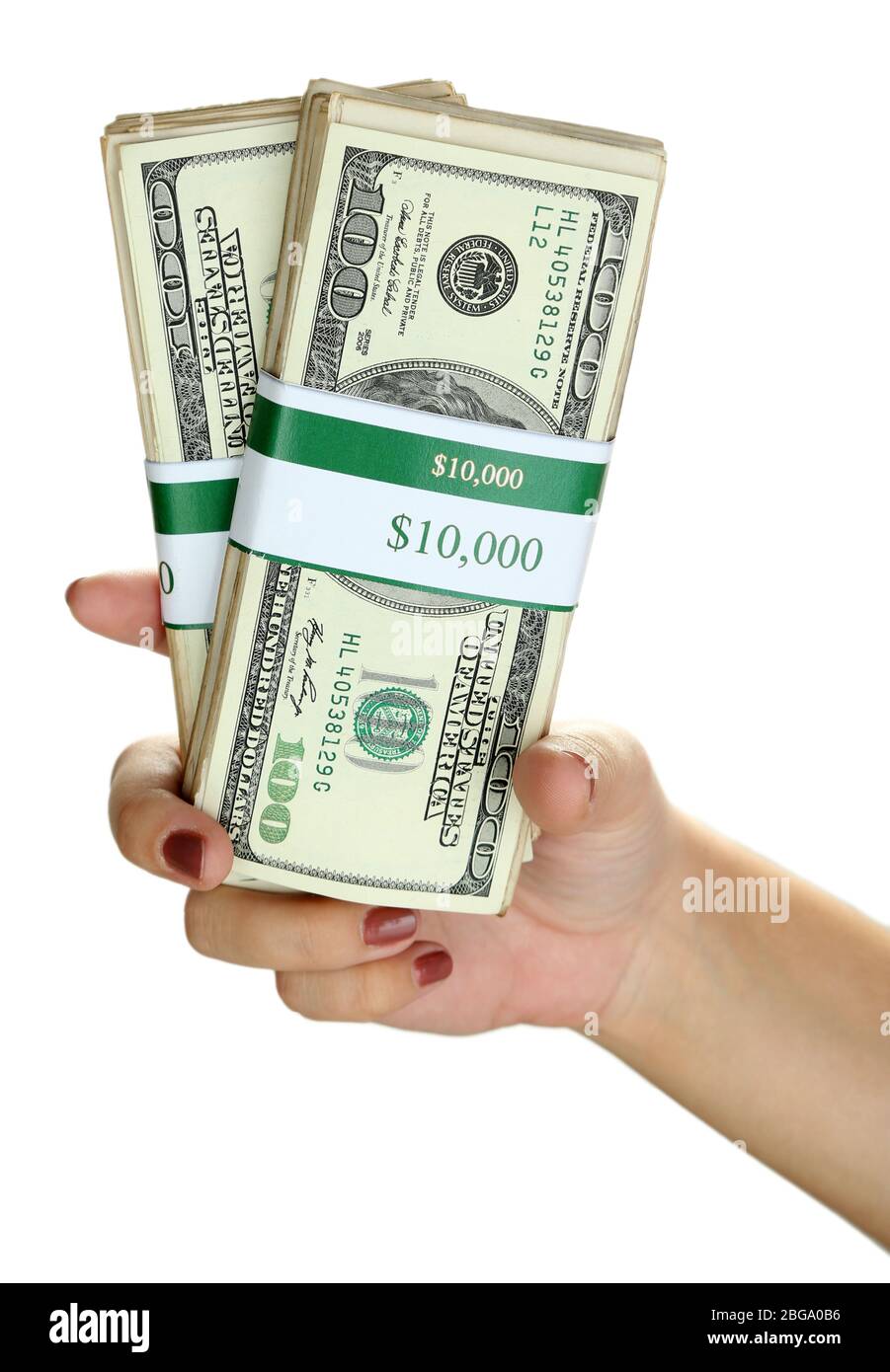 Packs of dollars in hand isolated on white Stock Photo - Alamy