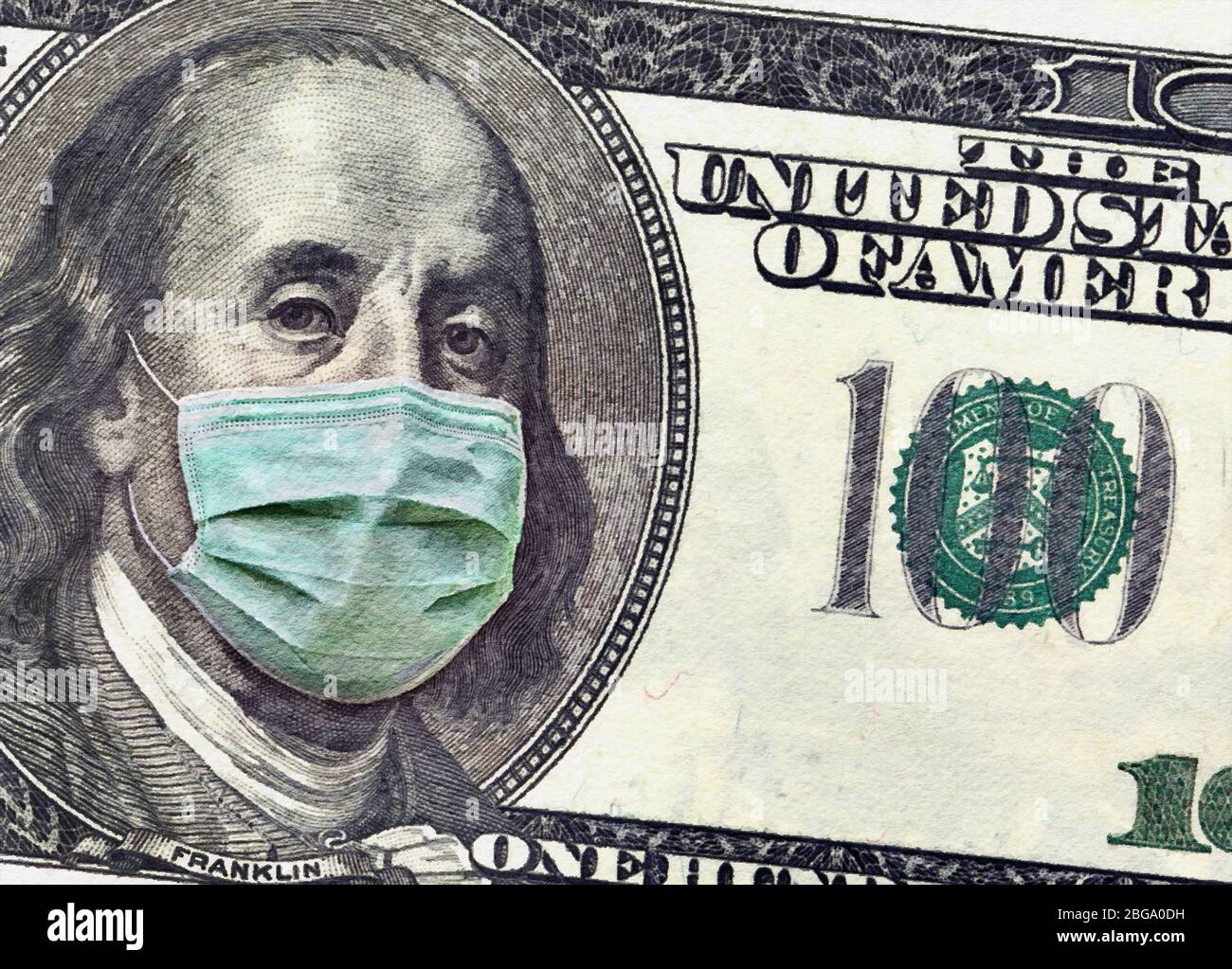 A close up of a 100 dollar bill shows Benjamin Franklin wearing a ...