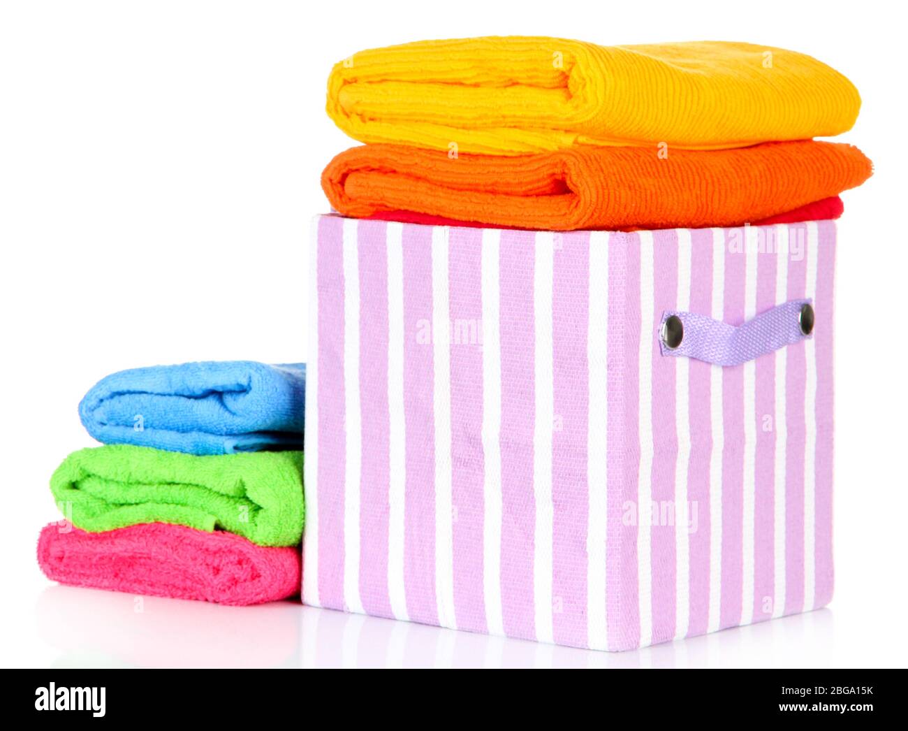 Textile box with bright towels, isolated on white Stock Photo - Alamy