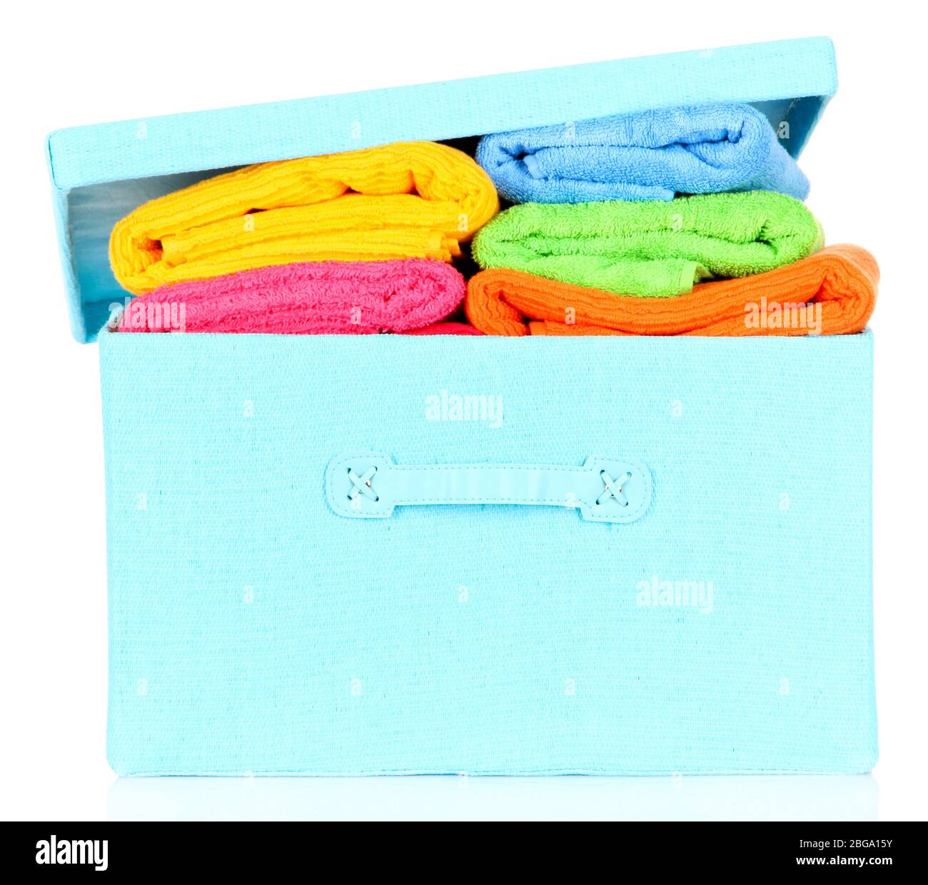 Textile box with bright towels, isolated on white Stock Photo - Alamy