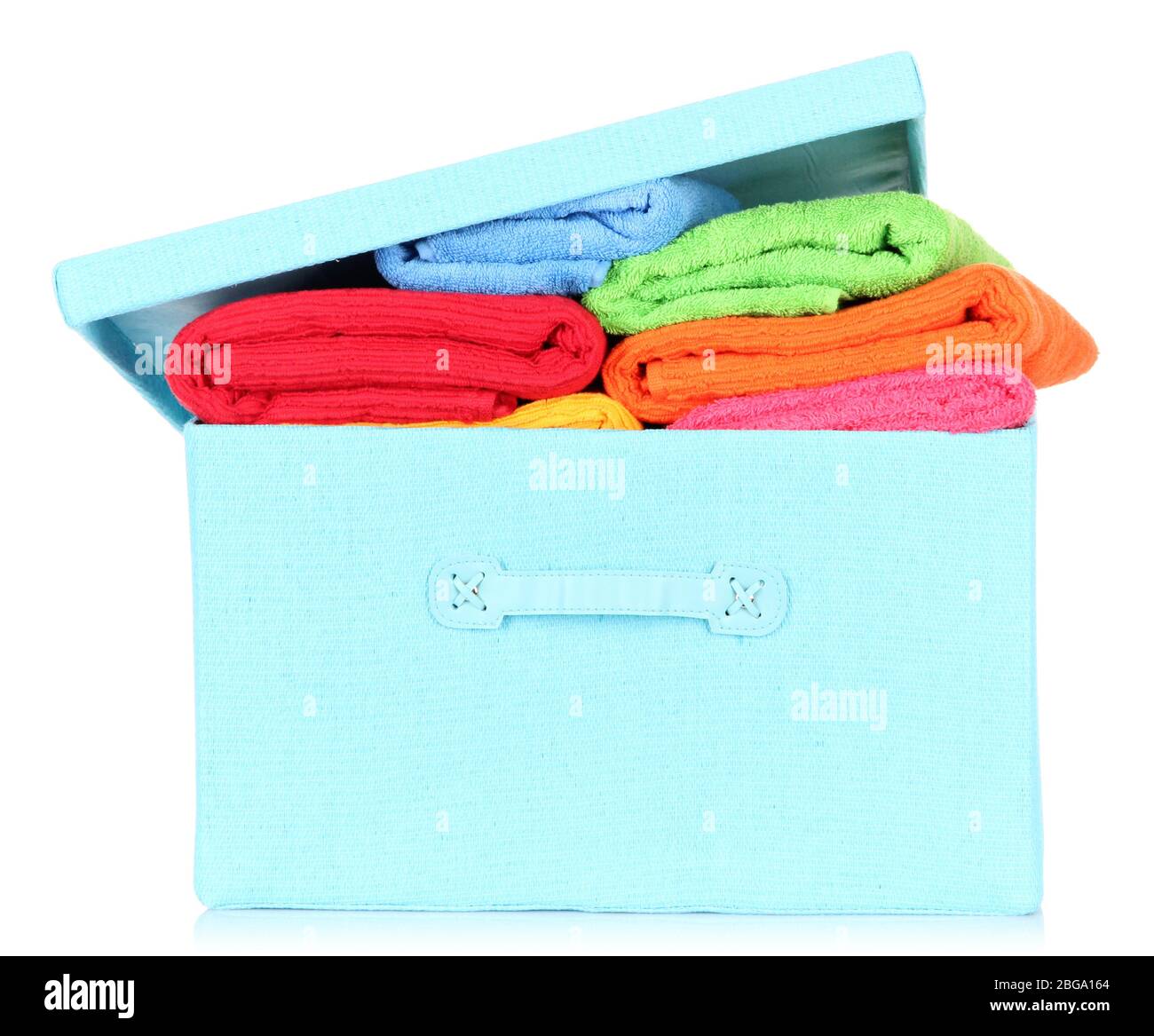 Textile box with bright towels, isolated on white Stock Photo - Alamy