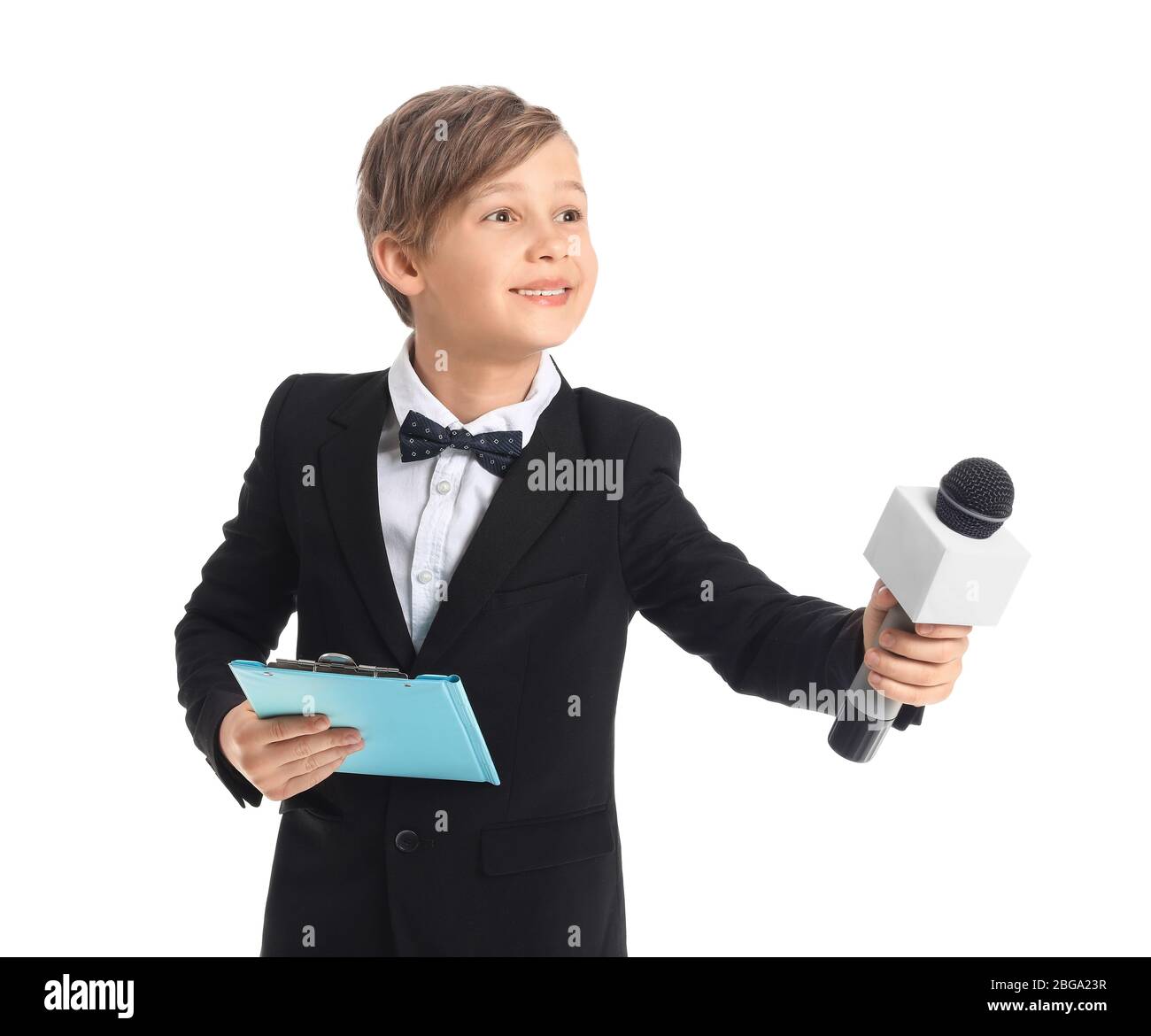 Little journalist with microphone on white background Stock Photo - Alamy