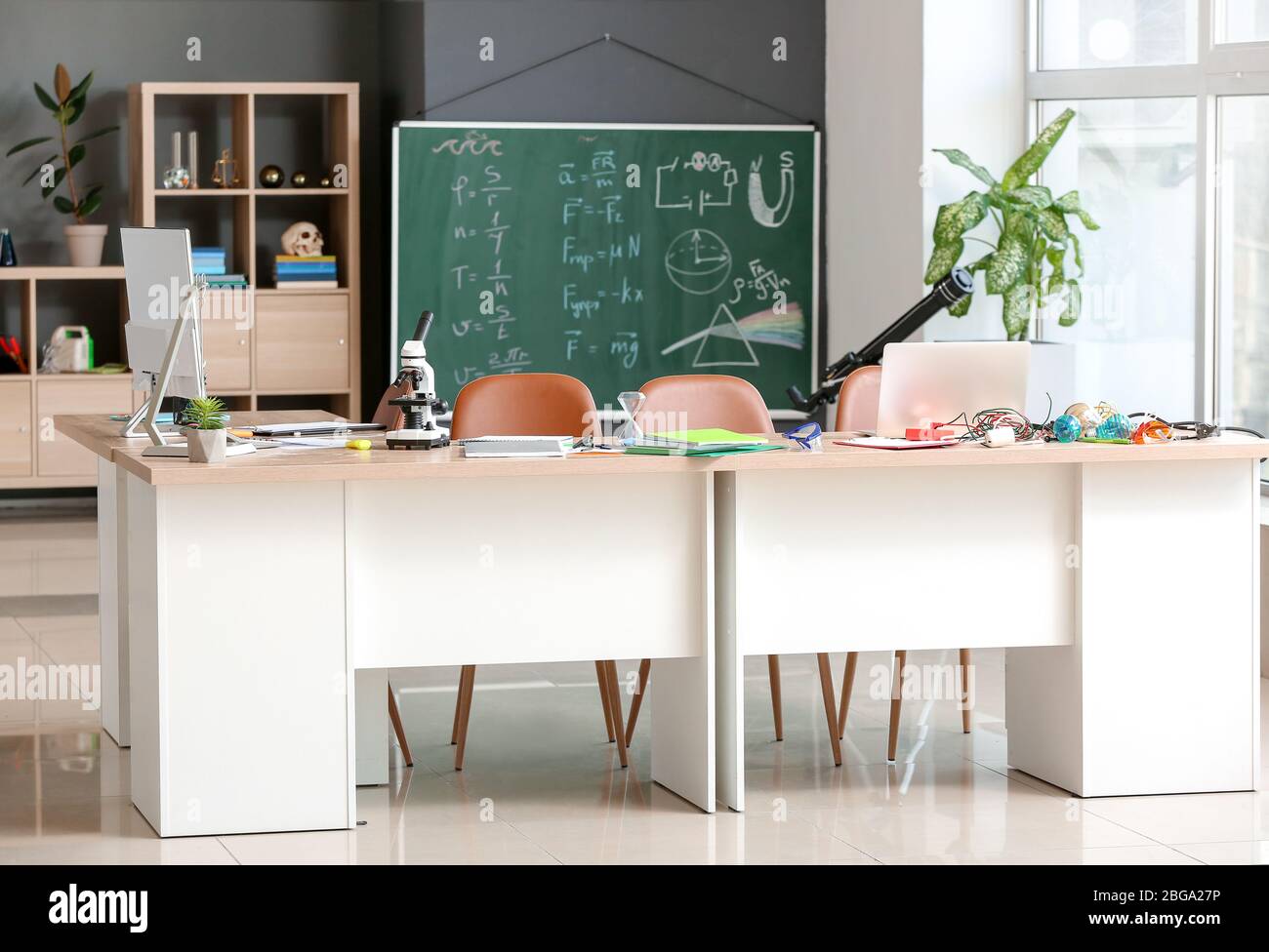 Interior of classroom prepared for physics lesson in modern school ...
