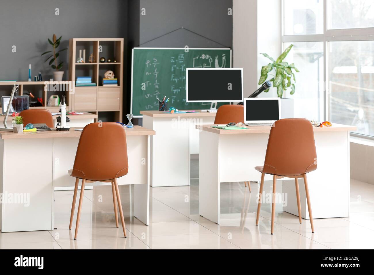 Interior of classroom prepared for physics lesson in modern school ...