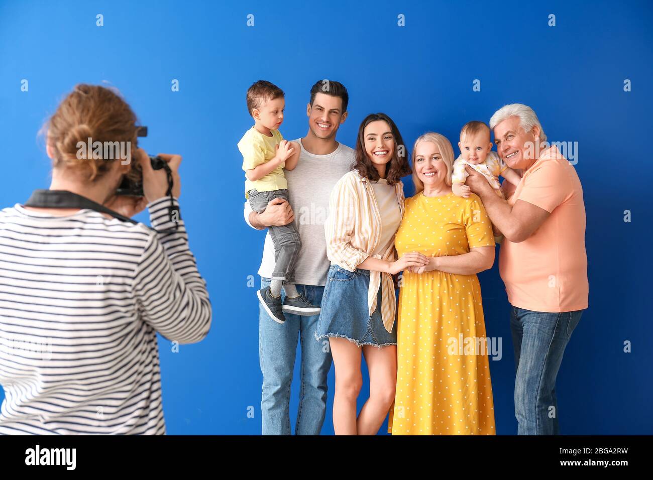 Female photographer taking pictures family hi-res stock photography and ...