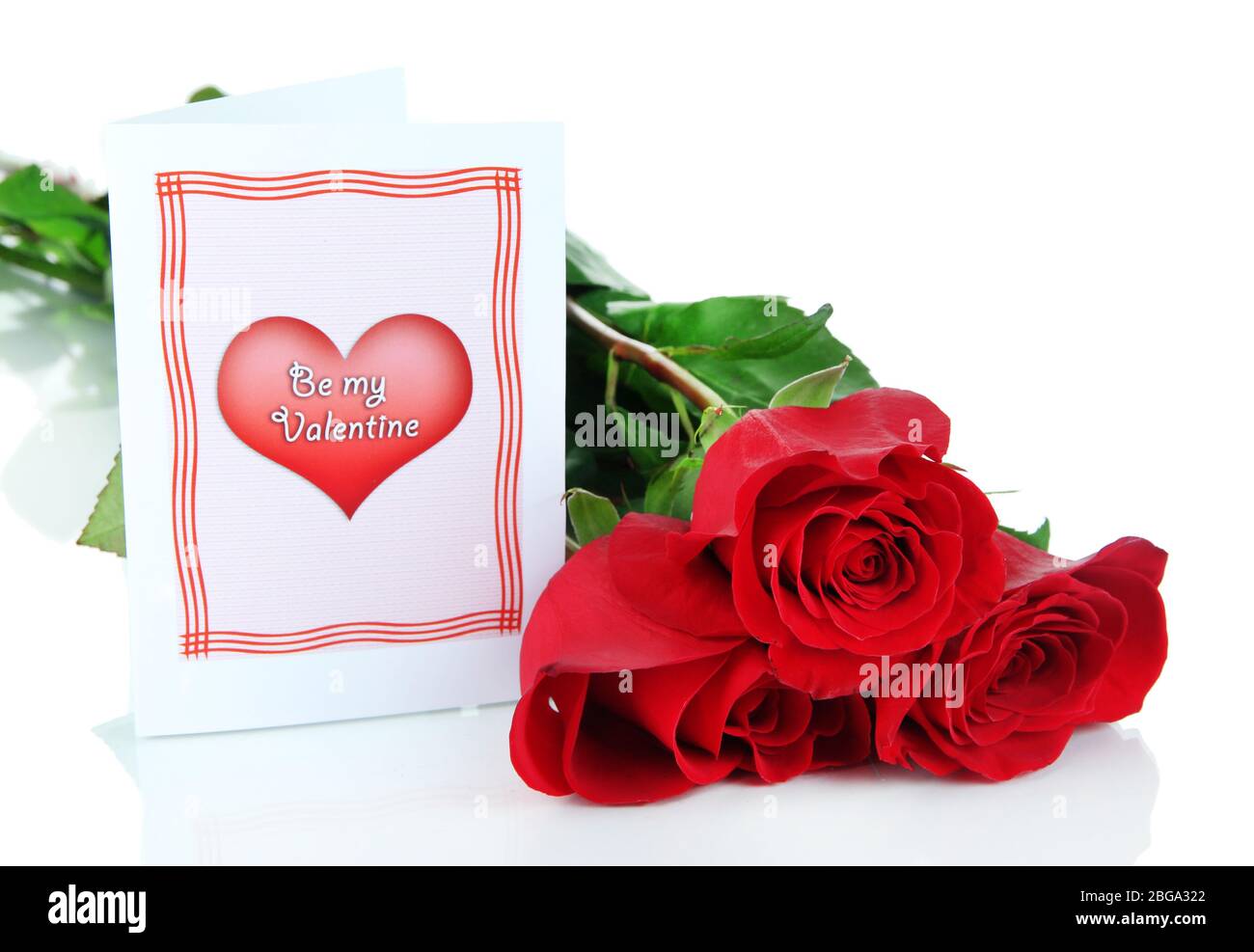 Beautiful red roses with card isolated on white Stock Photo - Alamy