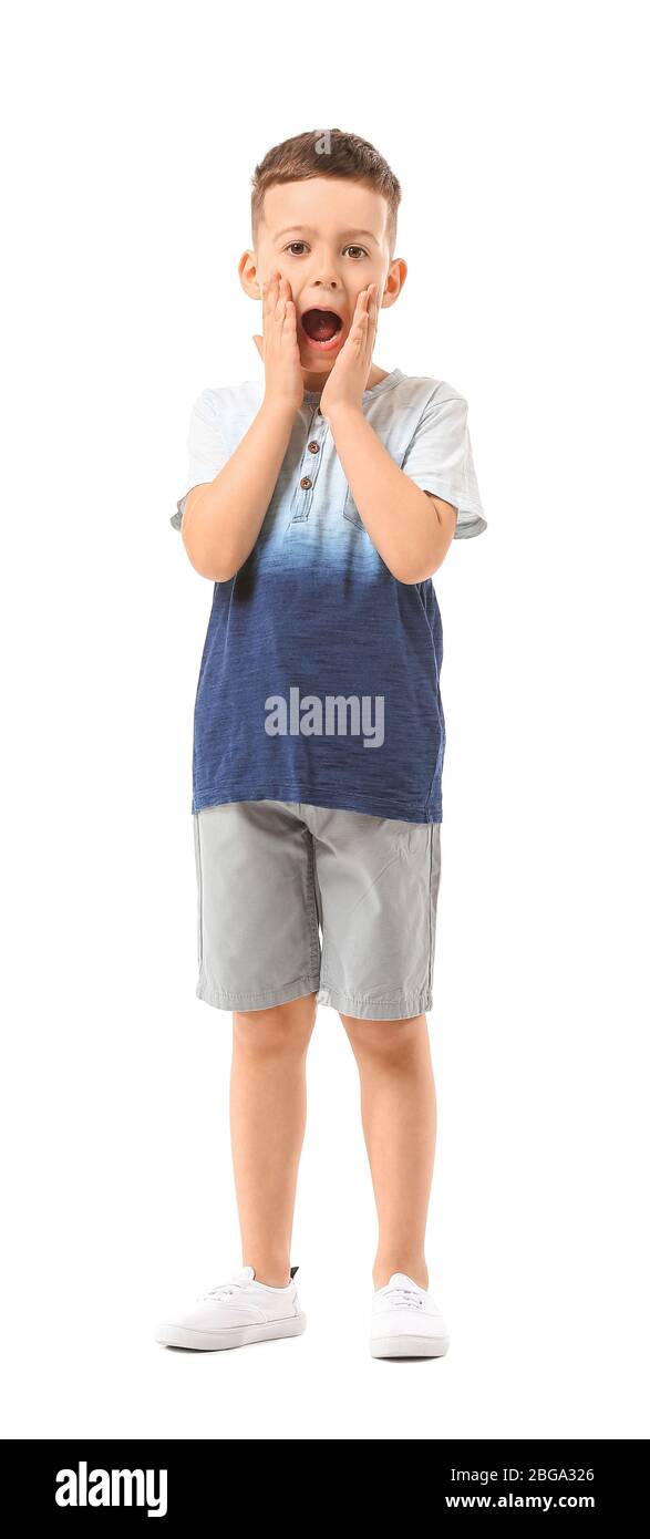 Surprised little boy on white background Stock Photo - Alamy