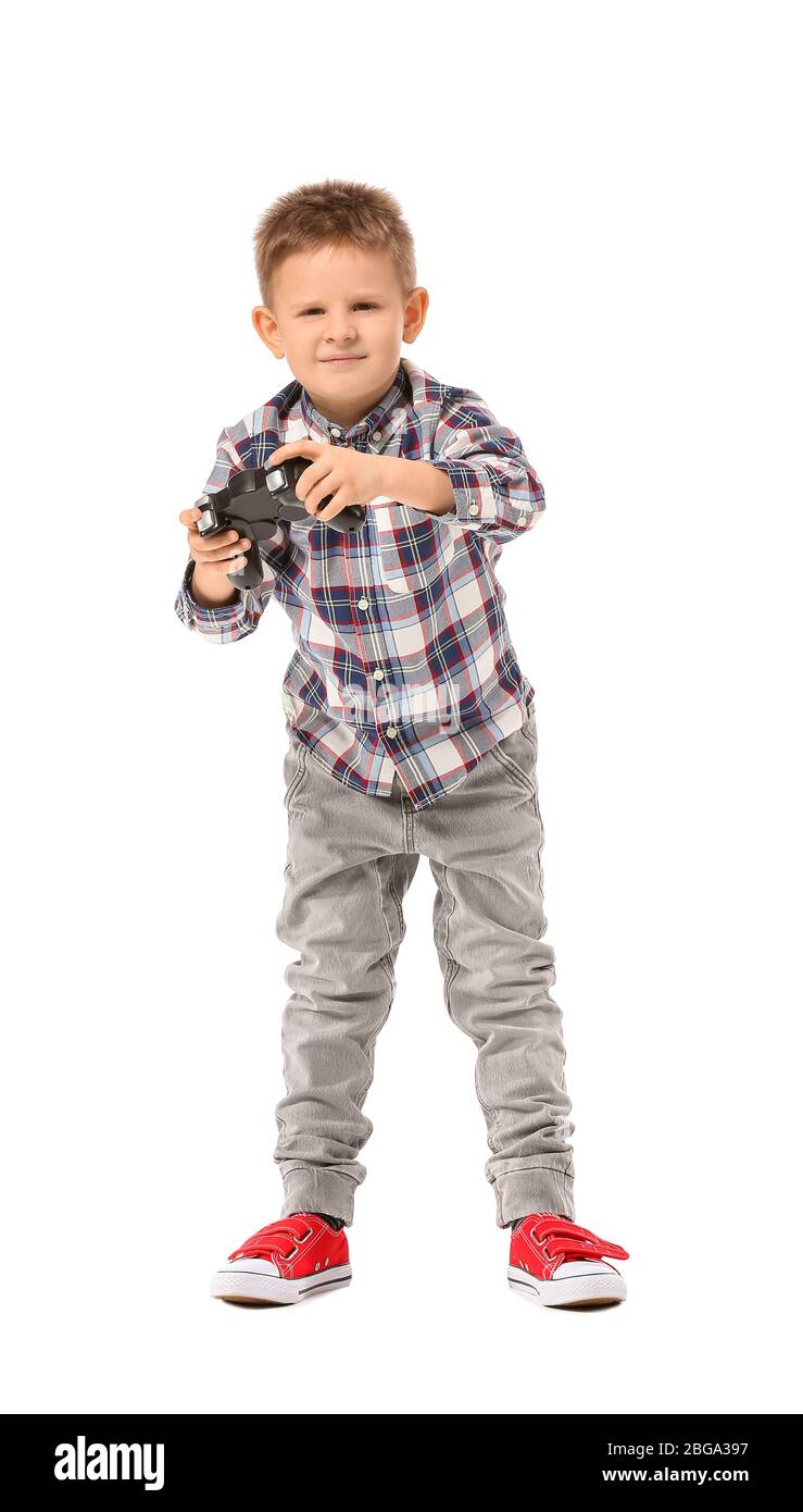 Cute little boy playing video games on white background Stock Photo - Alamy